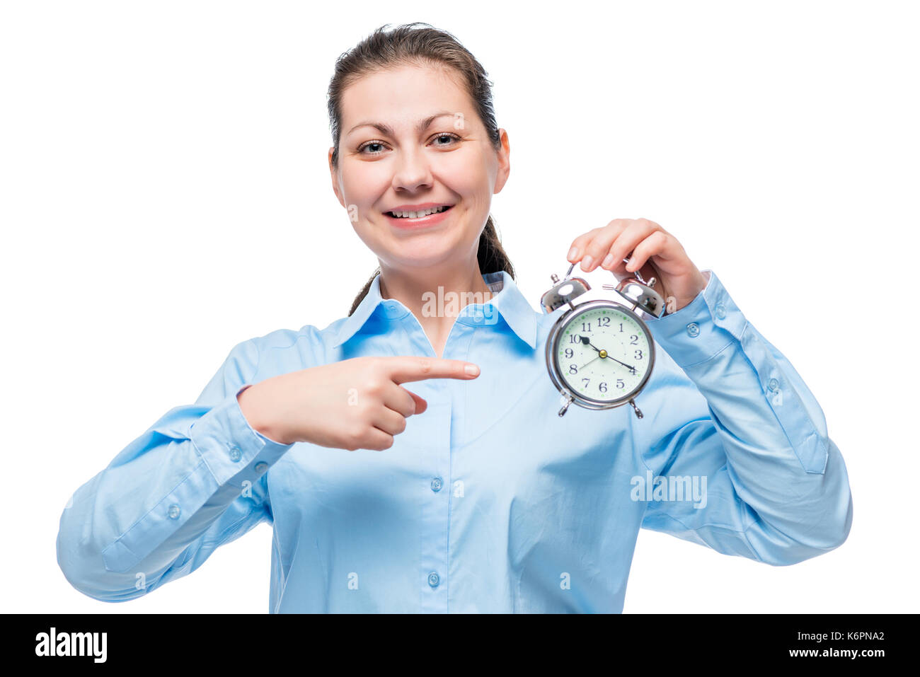 happy successful lady with an alarm clock in hand on a white background ...