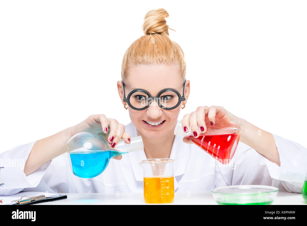 funny laboratory assistant chemist mixes fluids in test tubes Stock ...