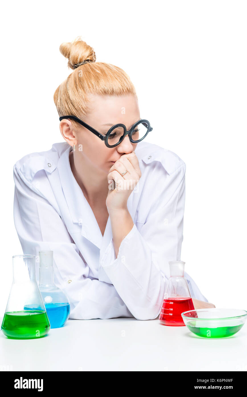 vertical portrait of a laboratory assistant in funny glasses with test ...