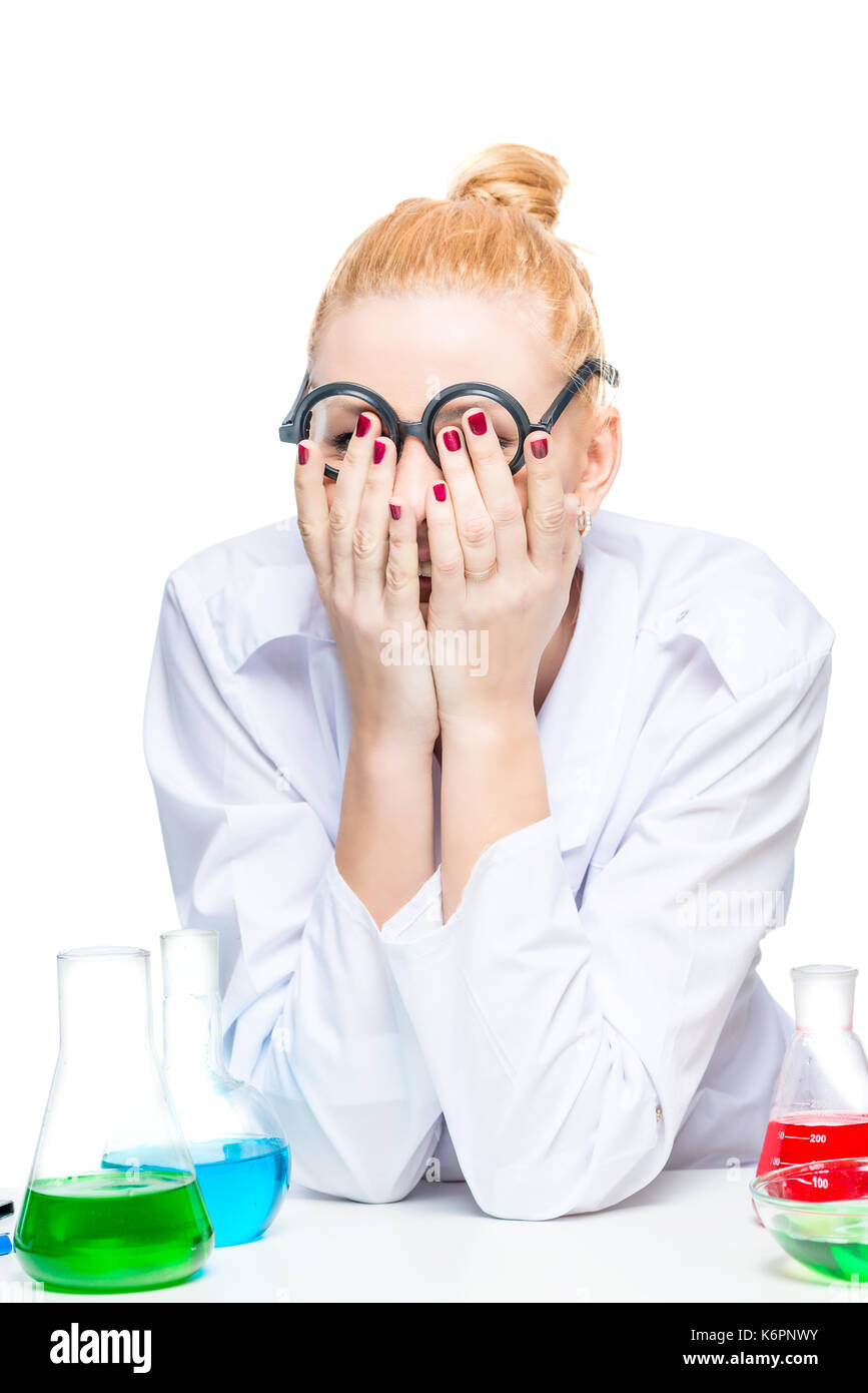 blond woman tired of laboratory tests with test tubes Stock Photo - Alamy