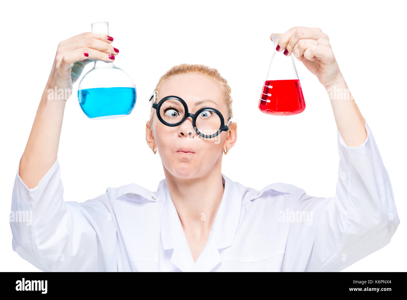 portrait of a mad lab technician with two flasks of colored substances ...