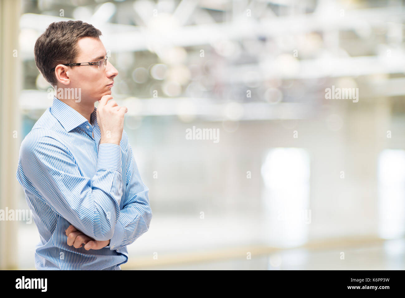 Pondering worker hi-res stock photography and images - Alamy