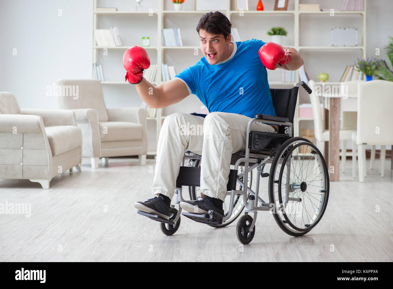 Wheelchair and boxing gloves hi-res stock photography and images - Alamy