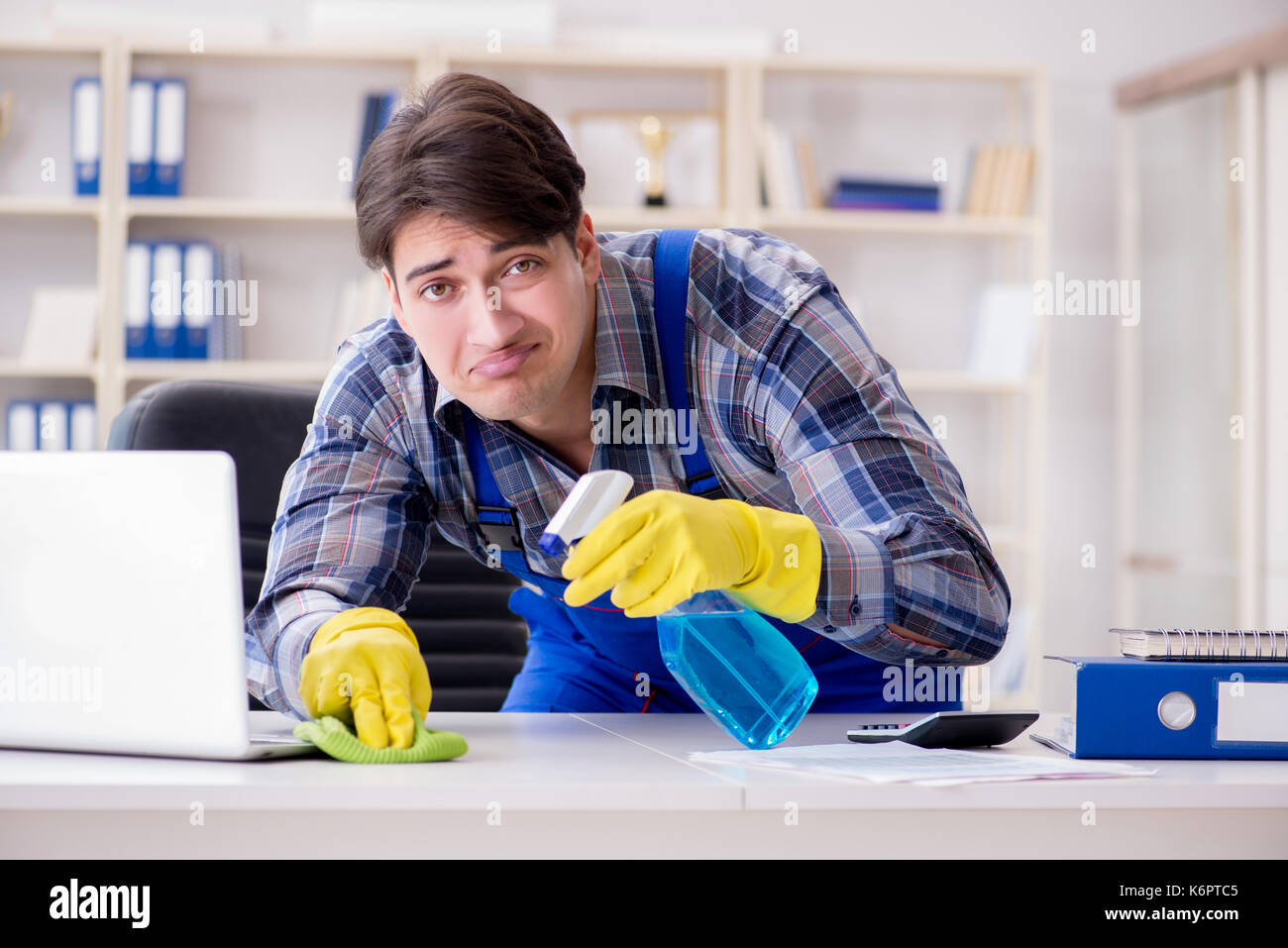Tired male cleaner mopping hi-res stock photography and images - Alamy