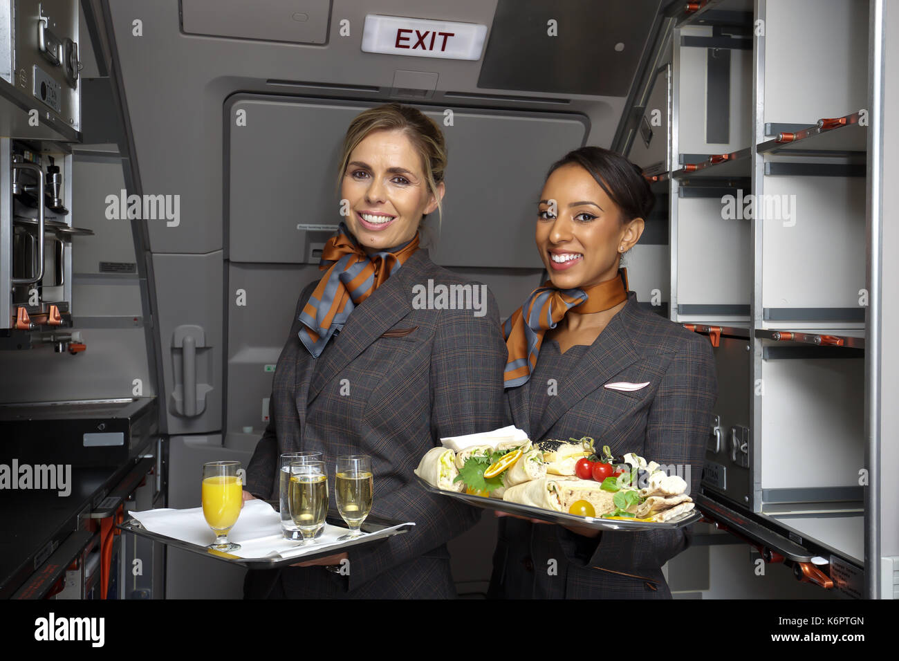 Air steward on board a plane at the Air Charter Expo 2017 at London ...