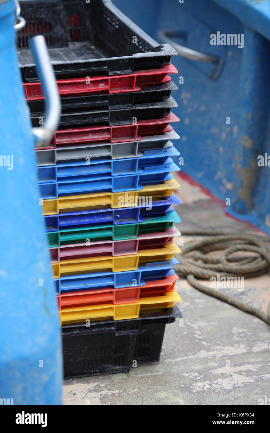 Colourful Stack of Fish Crates on a Vessel Stock Photo - Alamy