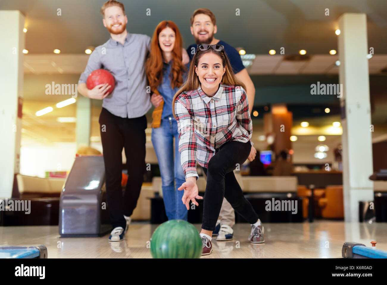 Happy group people bowling having hi-res stock photography and images ...