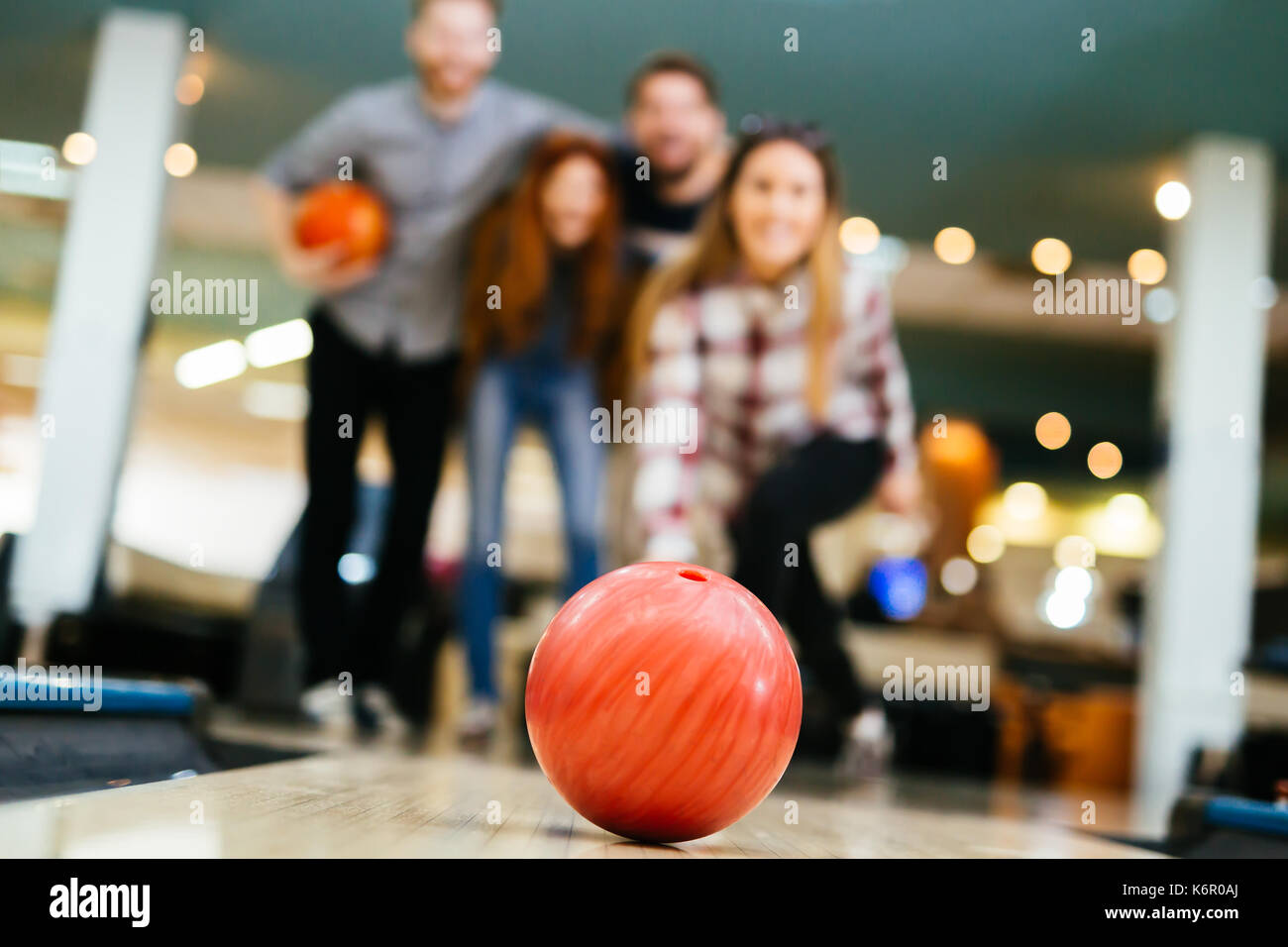 Happy group people bowling having hi-res stock photography and images ...