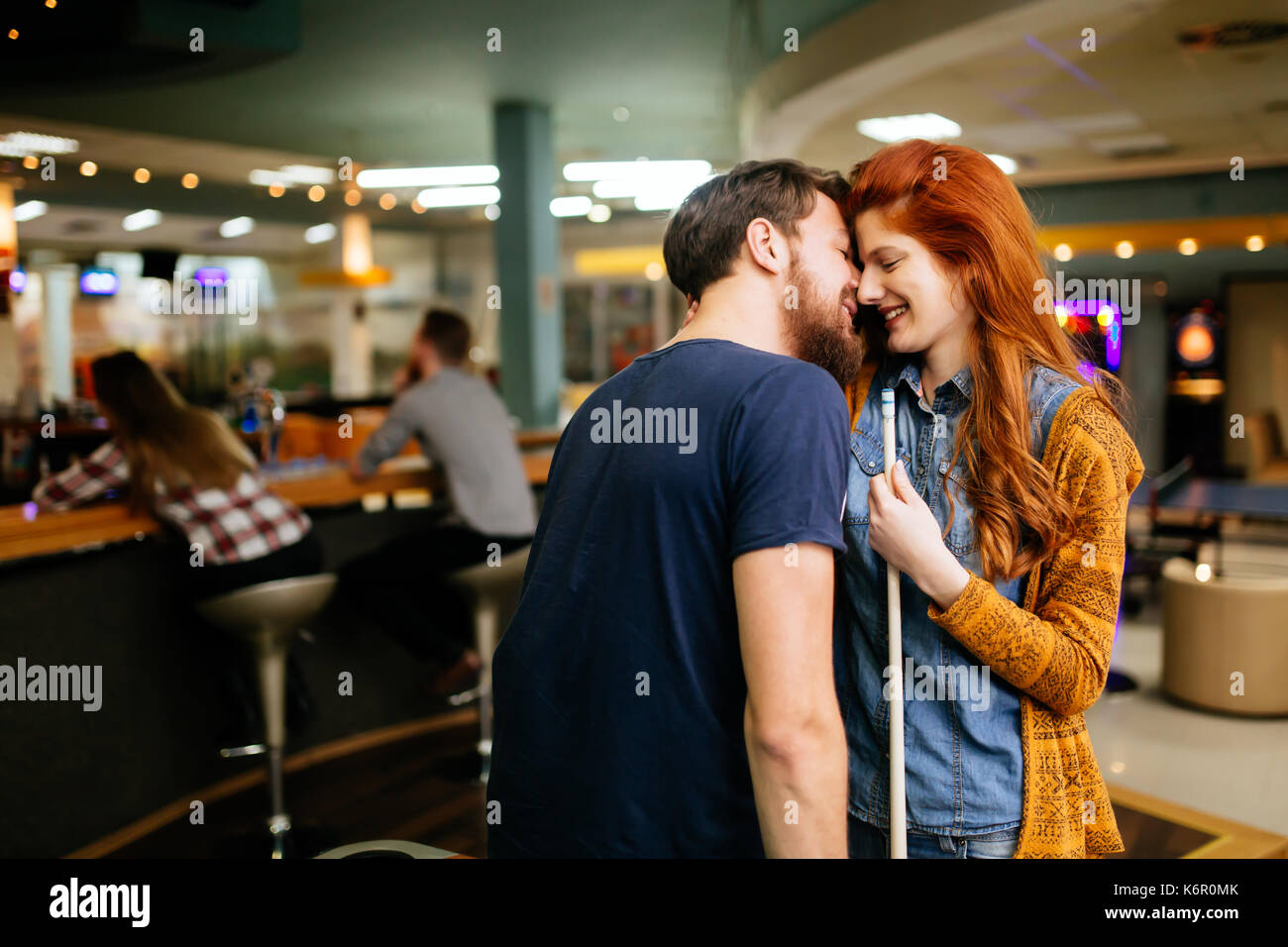 Couple at pool table hi-res stock photography and images - Alamy