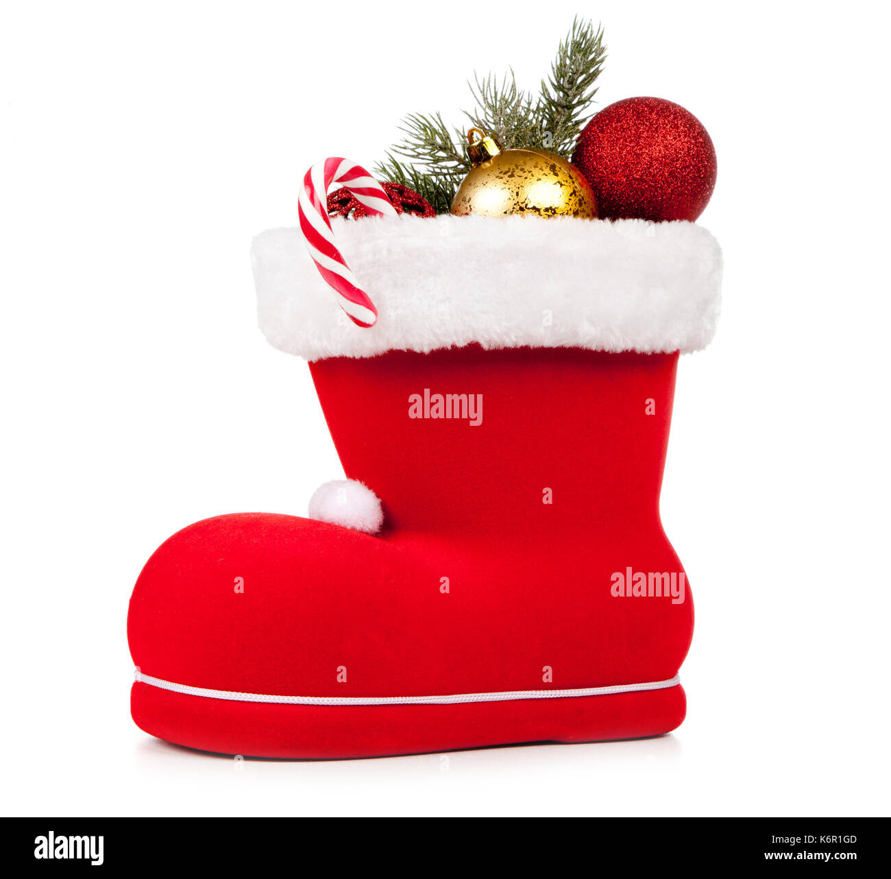 Santa's shoe on white background Stock Photo - Alamy