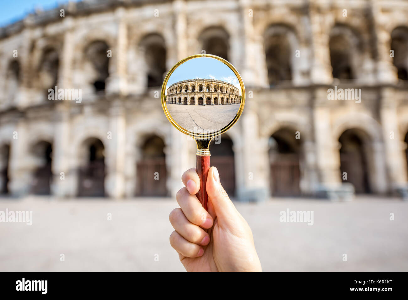 Looking through the magnifying glass on the old roman amphitheatre in ...