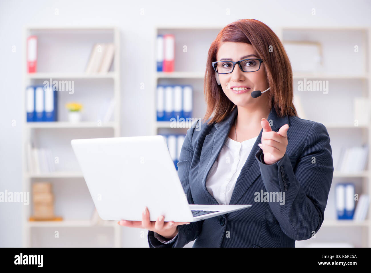 Call center operator working with clients Stock Photo - Alamy