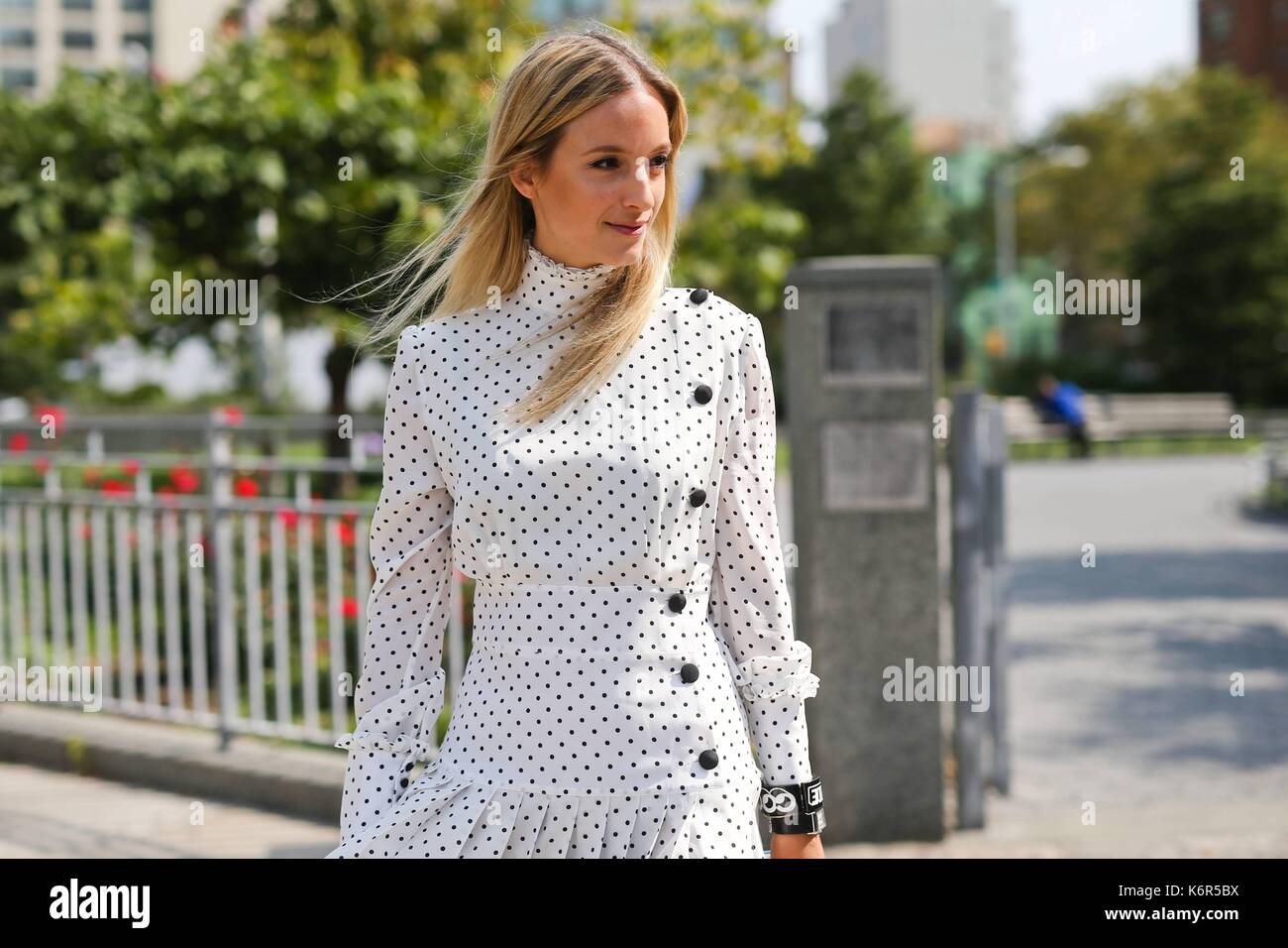 Blogger Charlotte Groeneveld posing outside of the Zimmermann runway ...