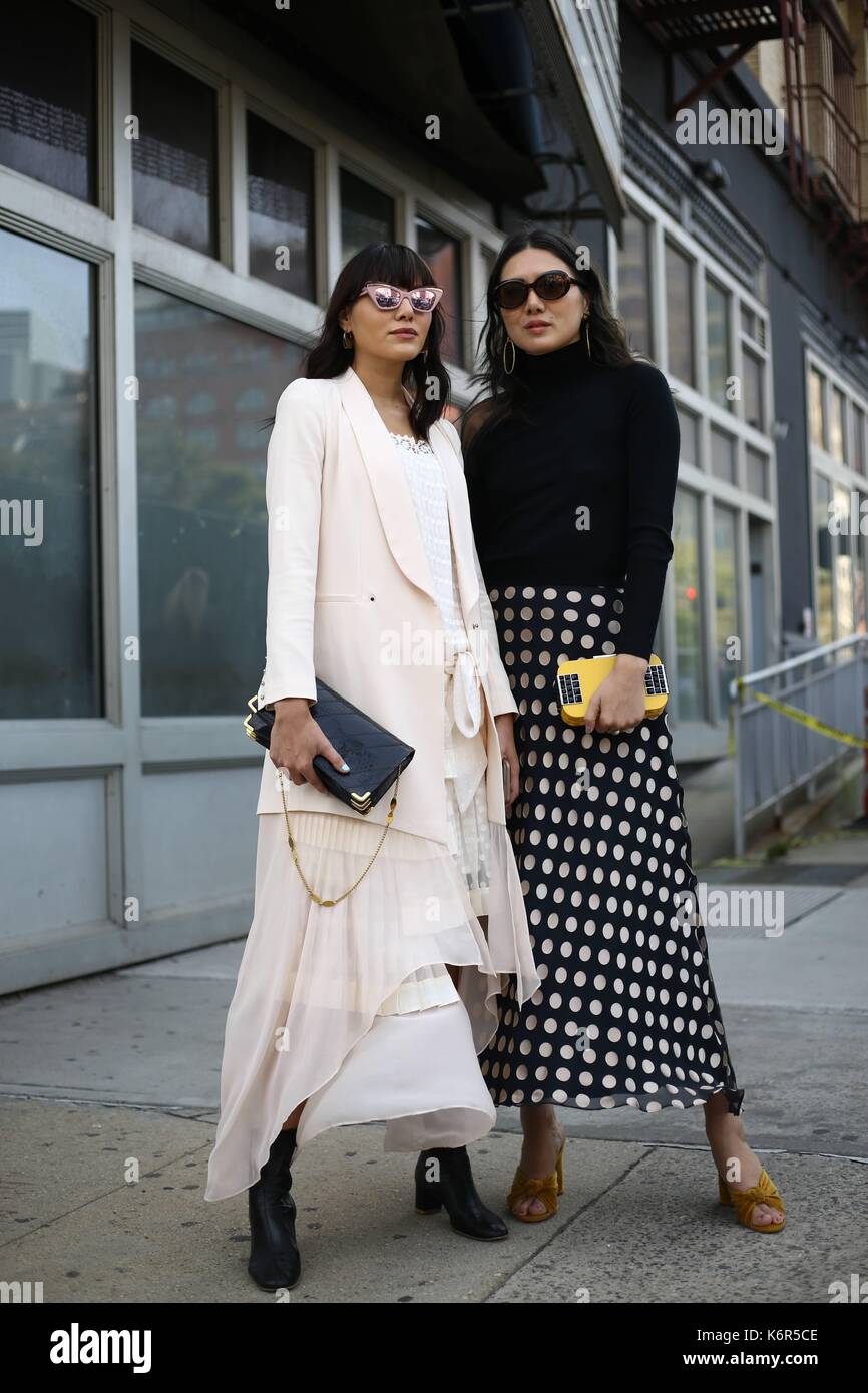 Natalie and Dylana Lim Suarez posing outside of the Zimmermann runway ...
