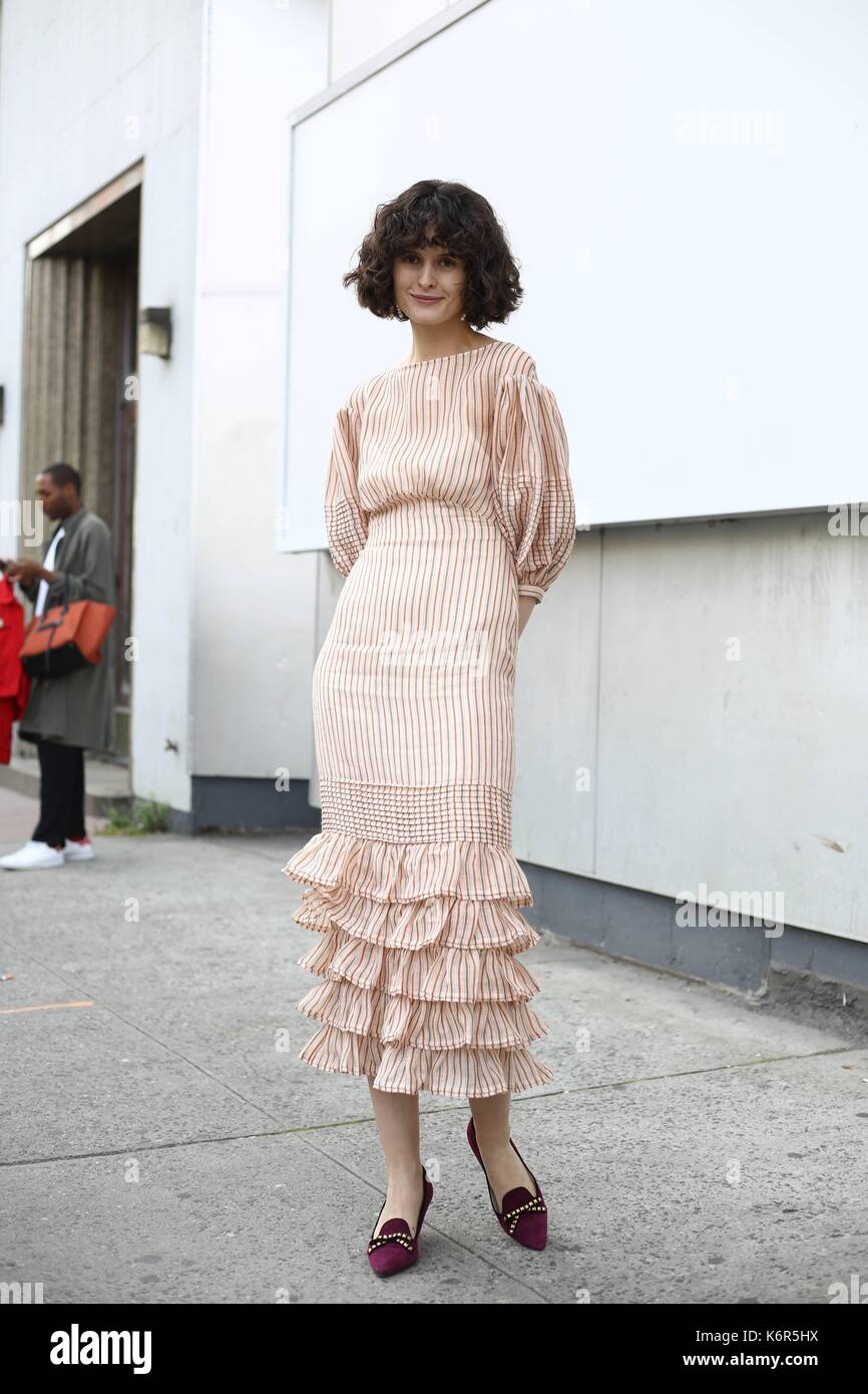 Stylist Chloe Hill posing outside of the Zimmermann runway show during ...