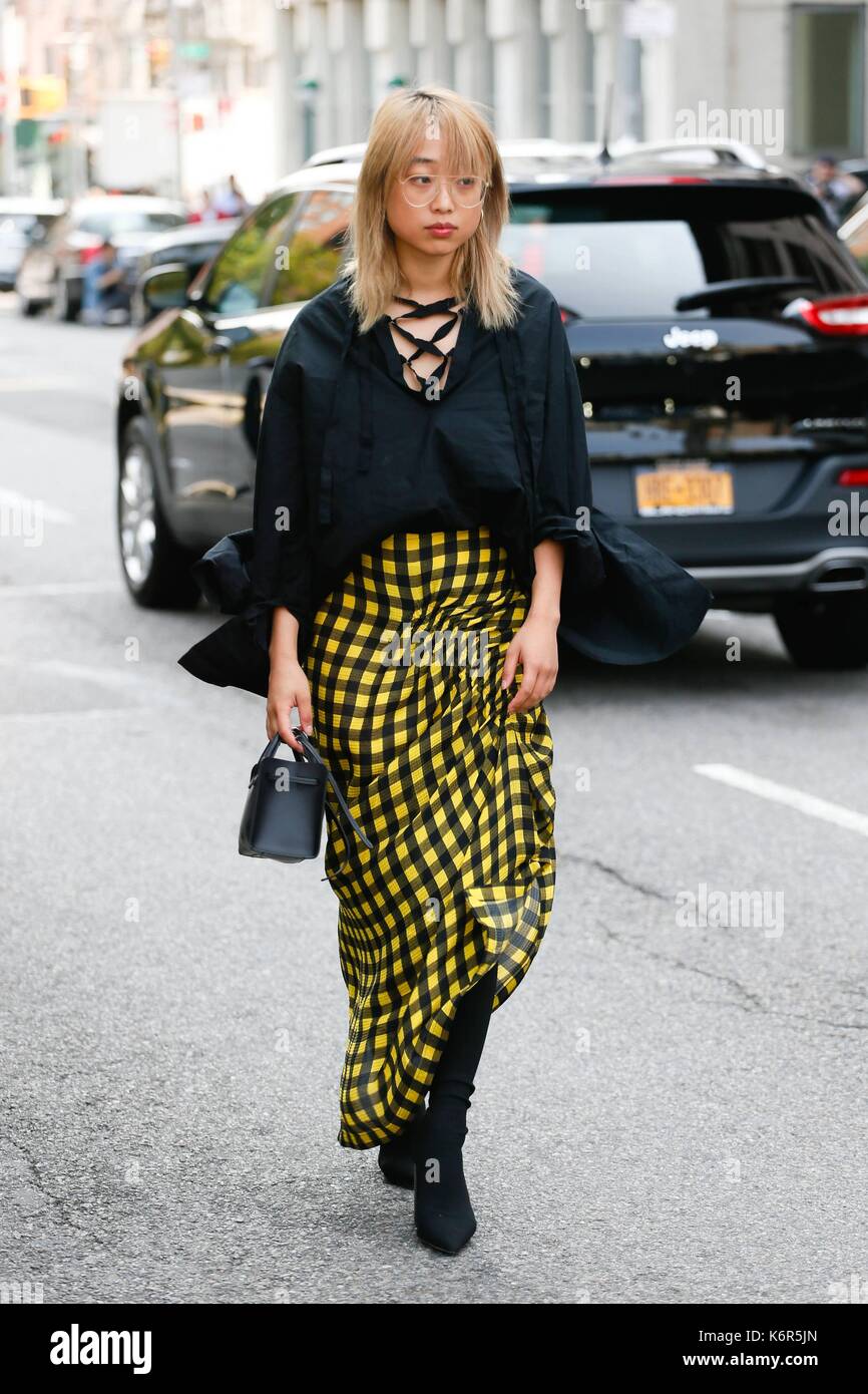 Writer and stylist Margaret Zhang posing outside of the Zimmermann ...