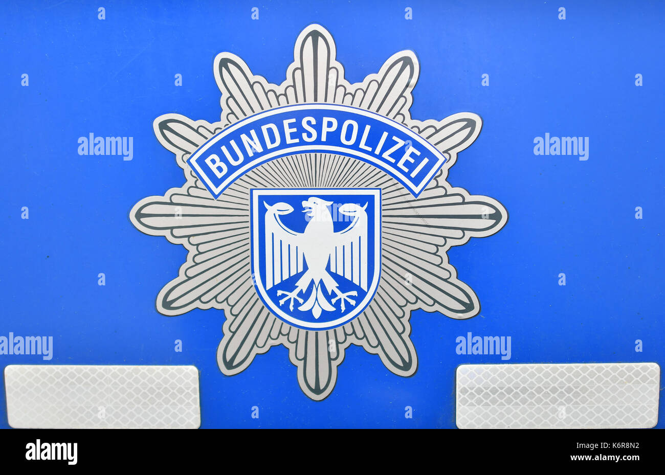 The arms of the German federal police force can be seen on a police ...