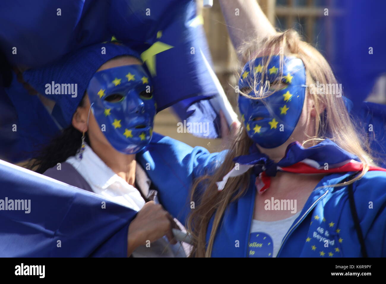 London, UK. 13th Sep, 2017. People in the EU masks with the flags are ...