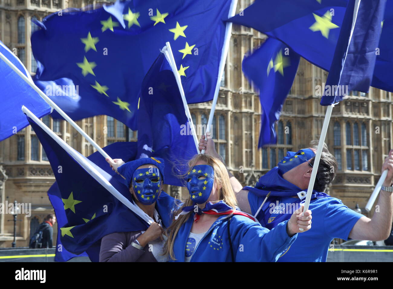 London, UK. 13th Sep, 2017. People in the EU masks with the flags are ...