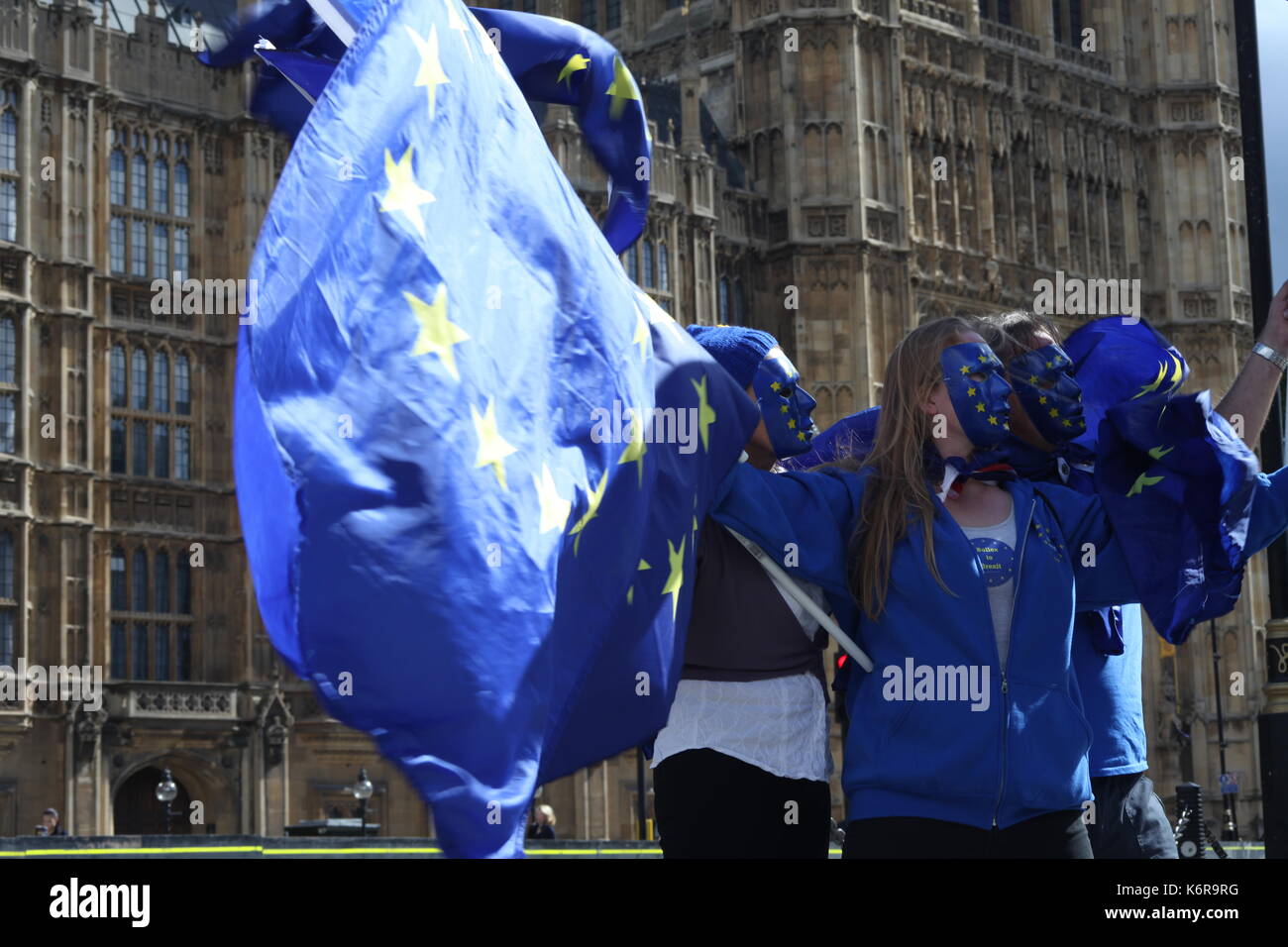 London, UK. 13th Sep, 2017. People in the EU masks with the flags are ...