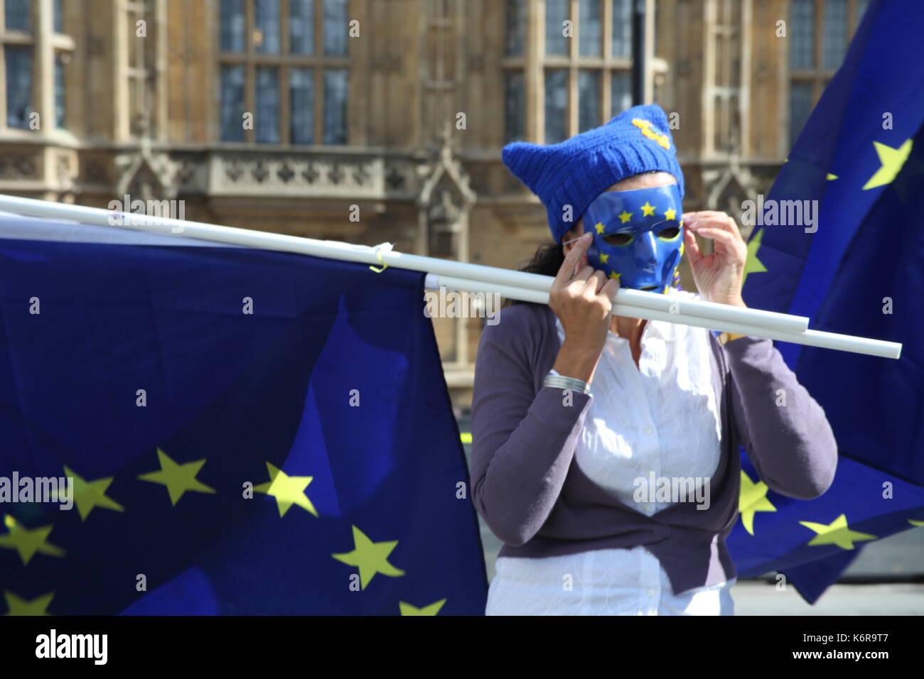 London, UK. 13th Sep, 2017. People in the EU masks with the flags are ...