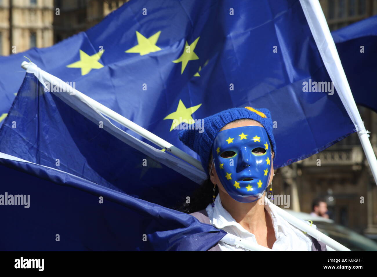 London, UK. 13th Sep, 2017. People in the EU masks with the flags are ...