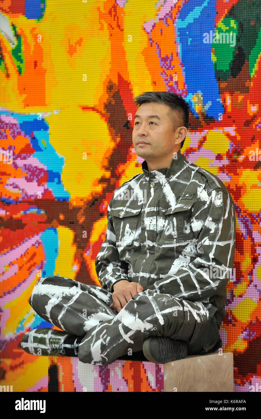 Chinese artist liu bolin hi-res stock photography and images - Alamy