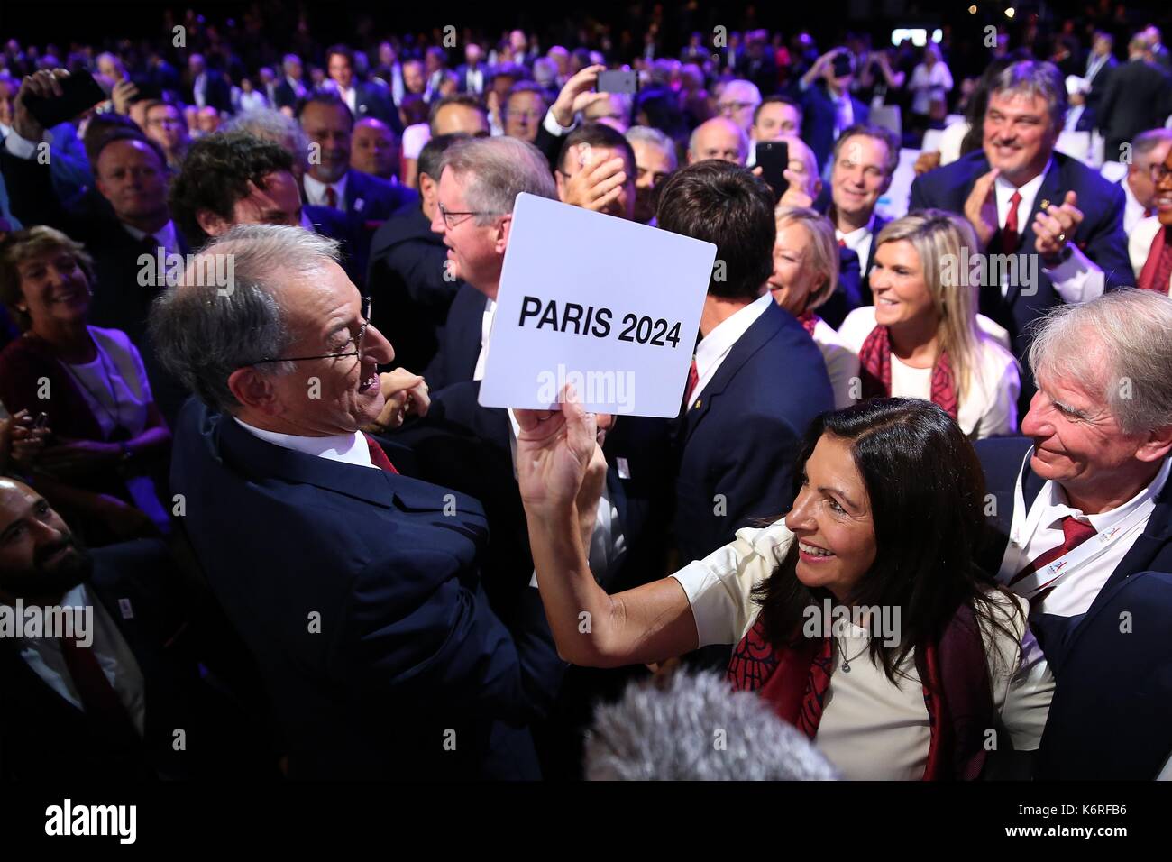 Lima, Peru. 13th Sep, 2017. Members of Paris 2024 celebrate after ...