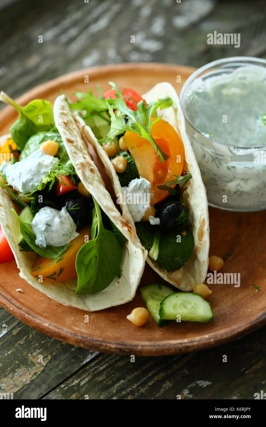 Vegetarian mexican tacos with sauce, food closeup Stock Photo - Alamy