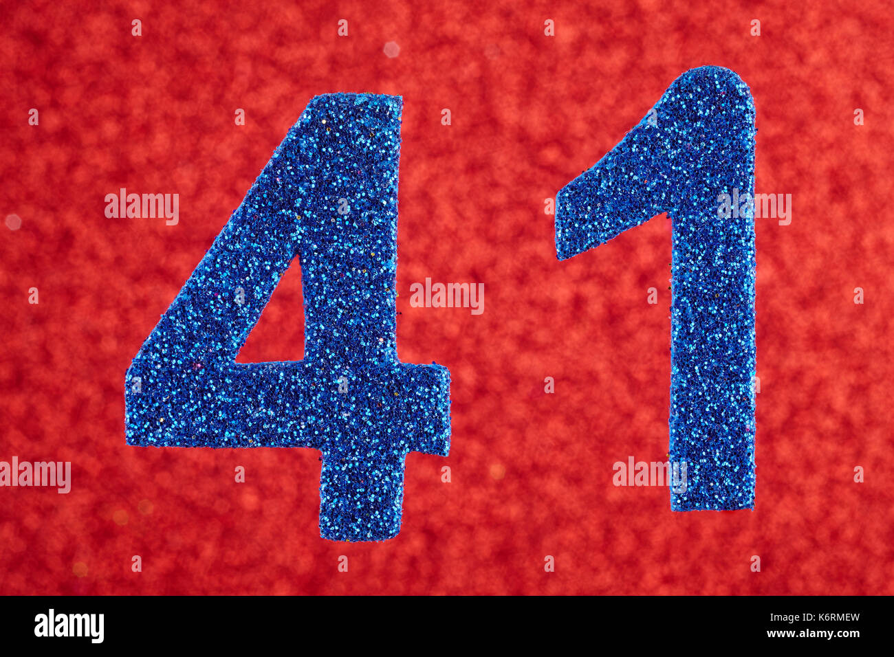 Number forty-one blue color over a red background. Anniversary ...