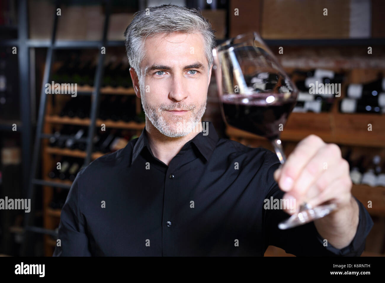 Sommelier tasting red wine. Wine cellar, men tasting red wine ...