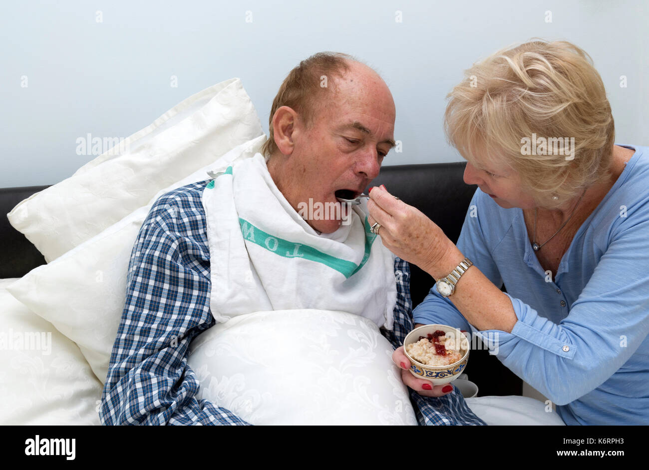 Sick bedridden man food wife hi-res stock photography and images - Alamy