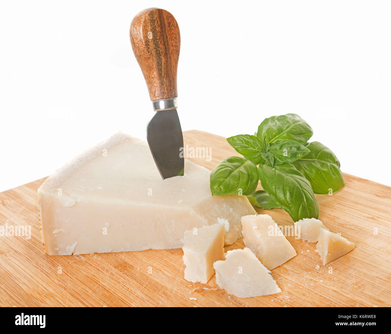parmesan cheese in front of white background Stock Photo - Alamy
