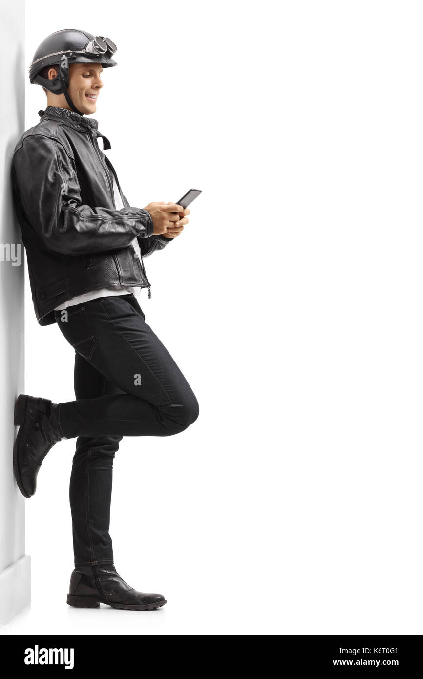 Leaning against wall pose hi-res stock photography and images - Alamy