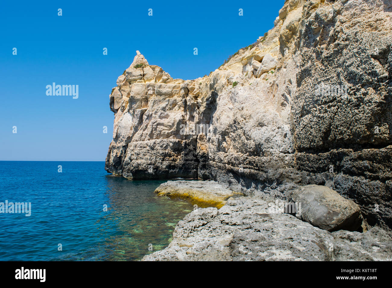 A cliff face along the Maltese coastline, showing features of sea ...