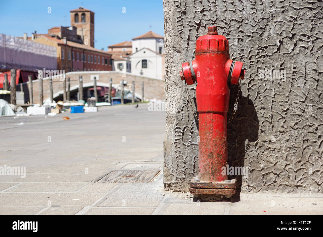 Old red fire hydrant in the street. Fire hidrant for emergency fire ...