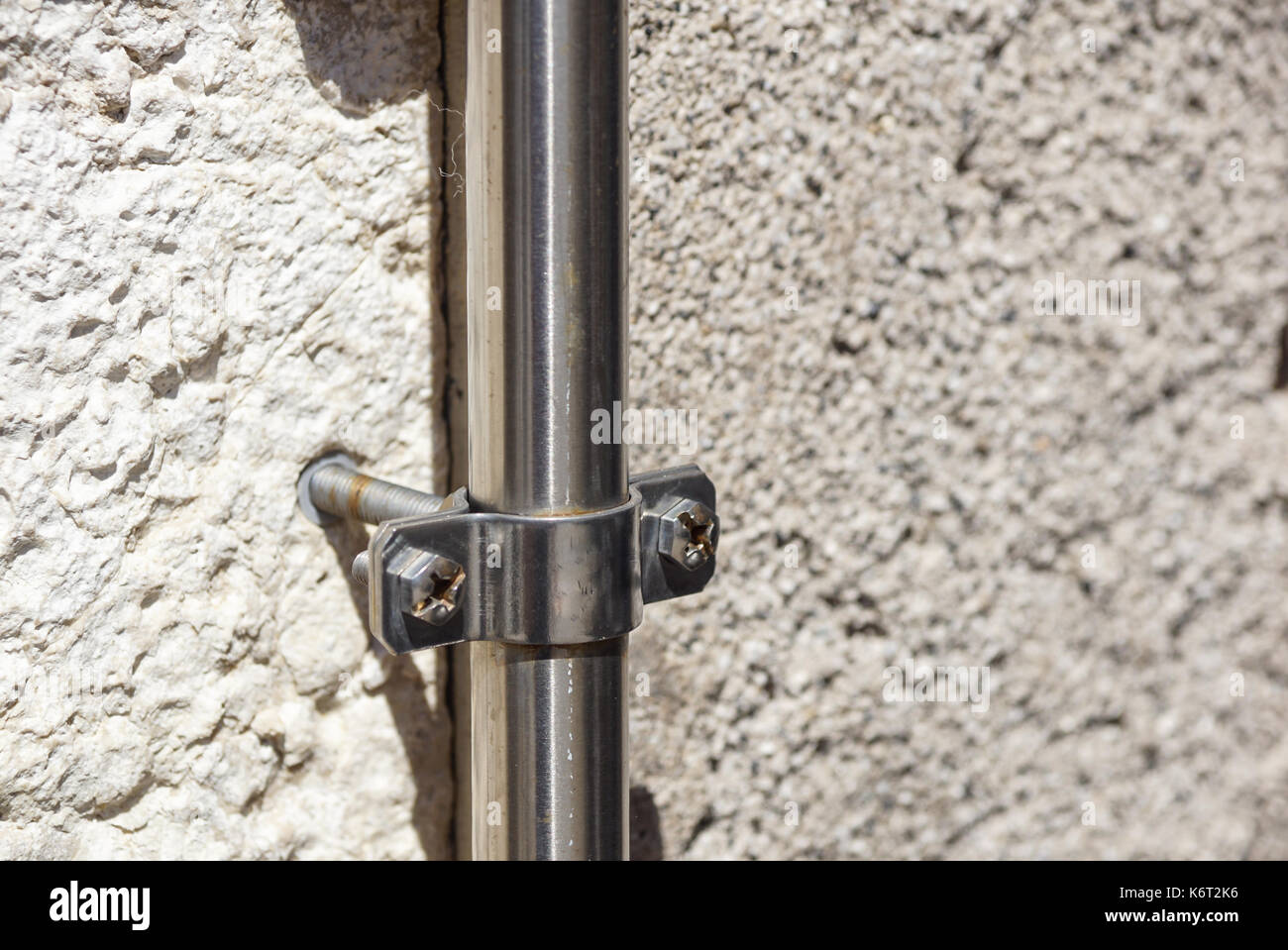 Old silver steel pipe and white texture wall Stock Photo - Alamy