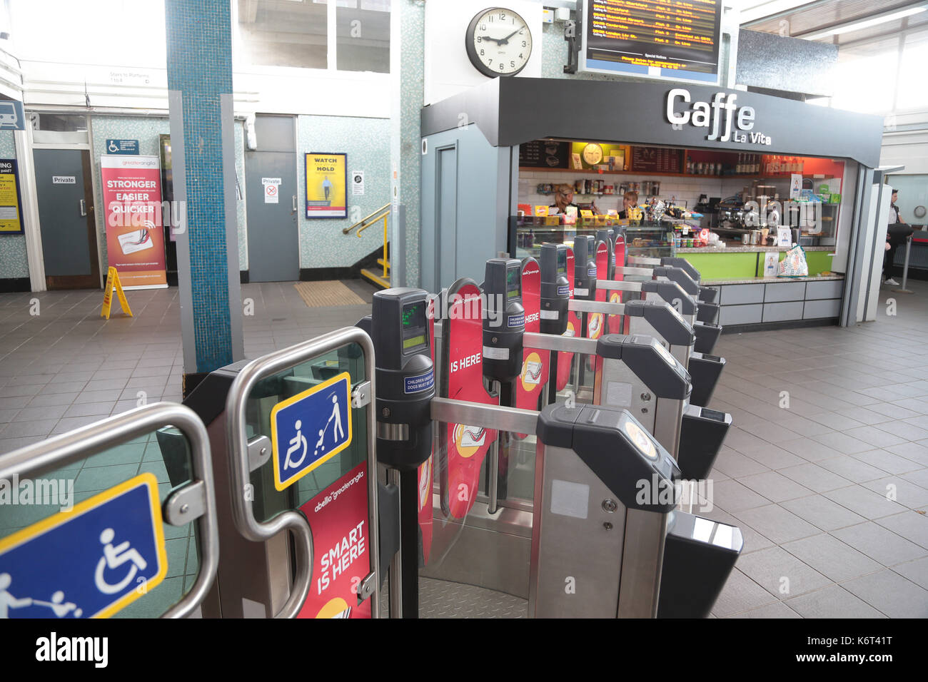 Harlow Town Train Station outside gateline sign Stock Photo - Alamy