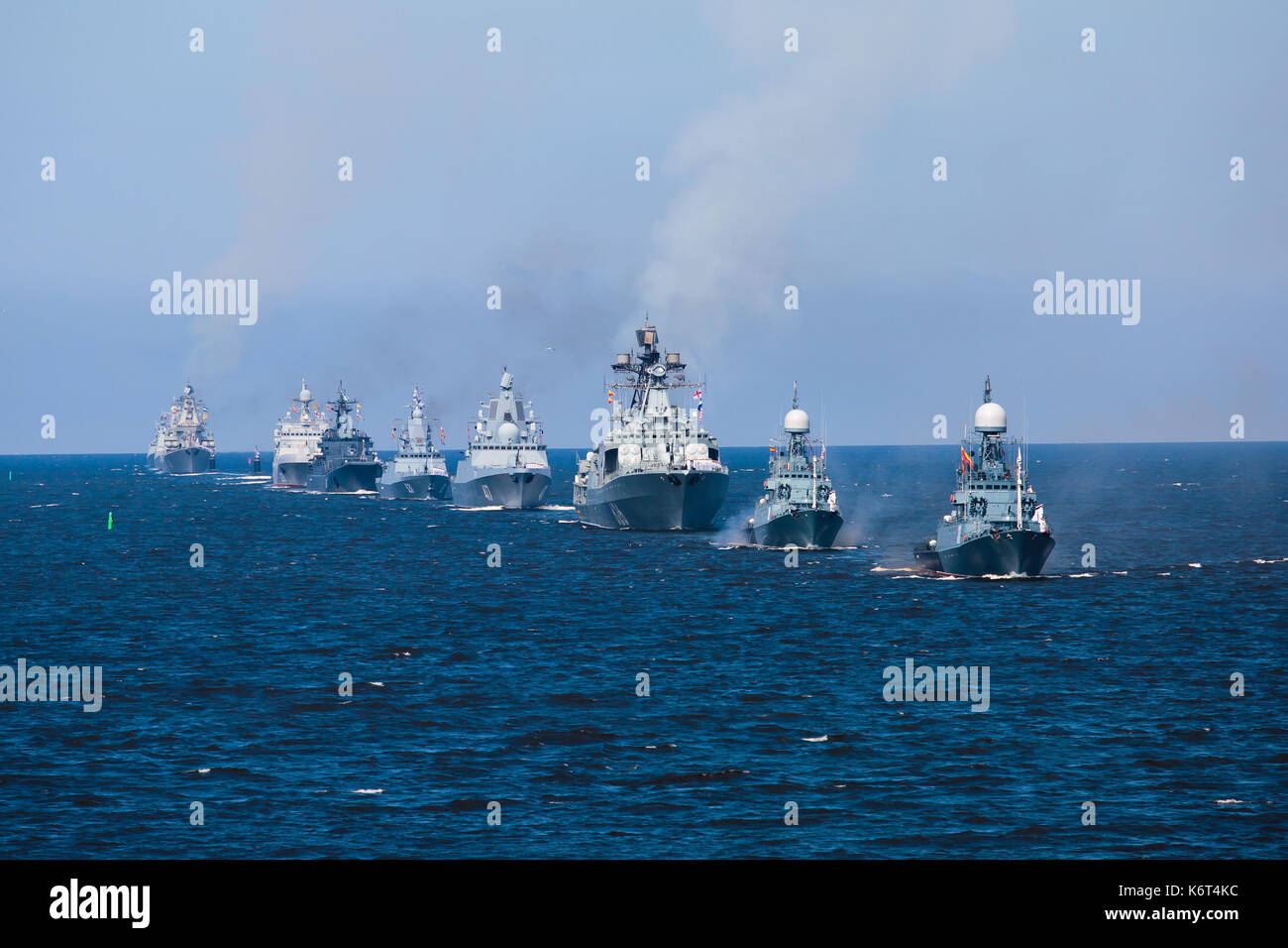 A line of modern russian military naval battleships warships in the row ...