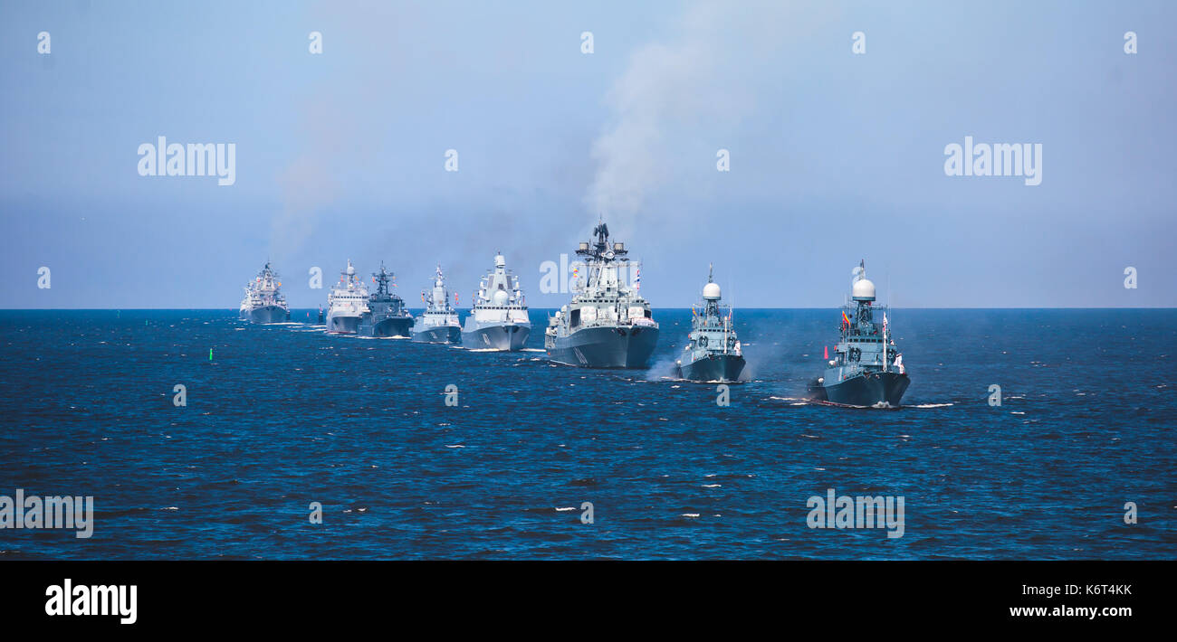 A line of modern russian military naval battleships warships in the row ...