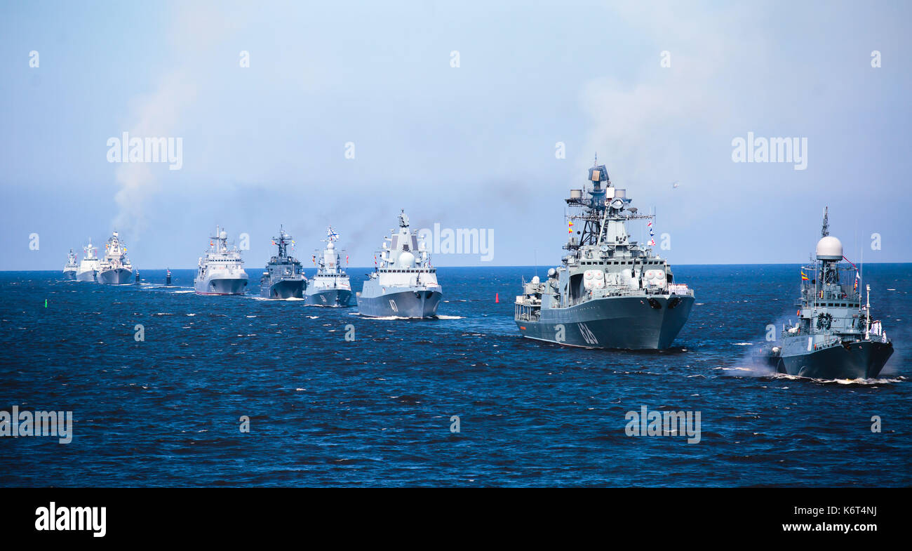 A line of modern russian military naval battleships warships in the row ...