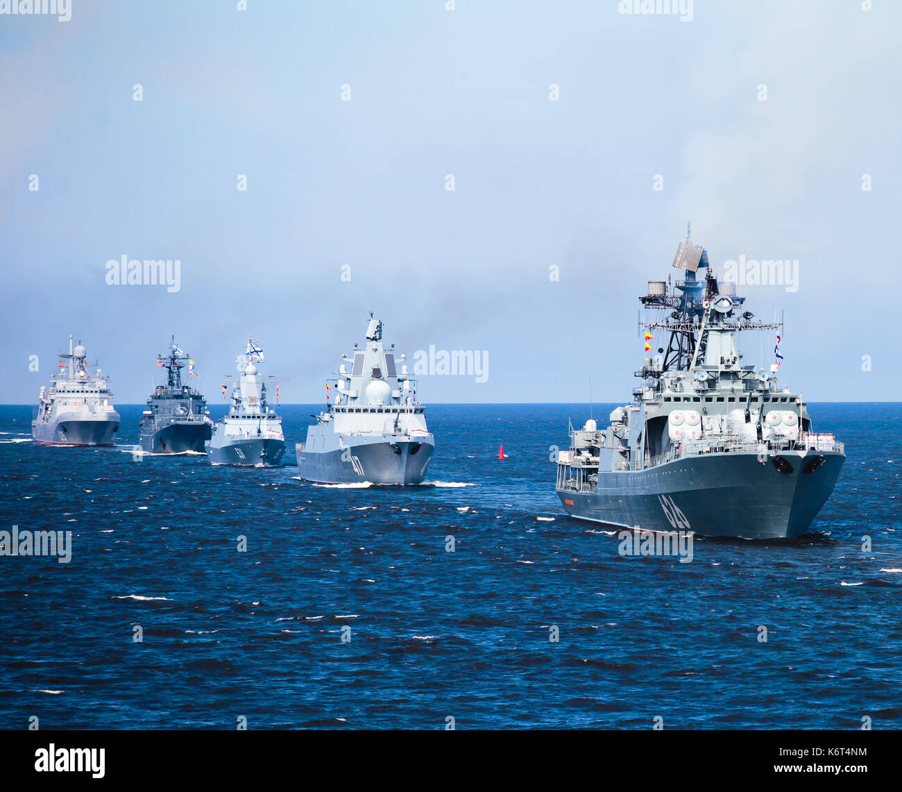 A line of modern russian military naval battleships warships in the row ...