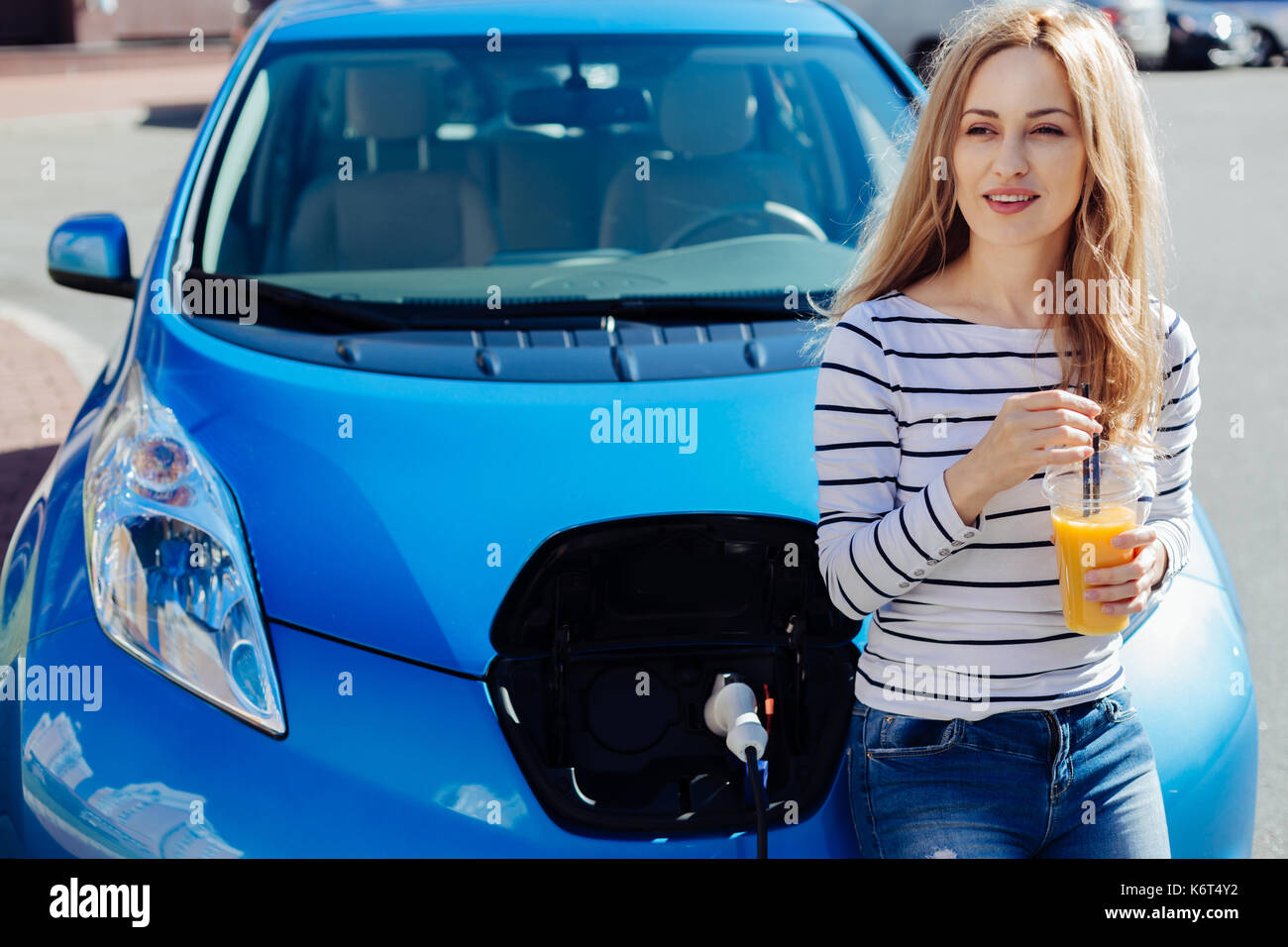 Woman car alone happy drive hi-res stock photography and images - Alamy