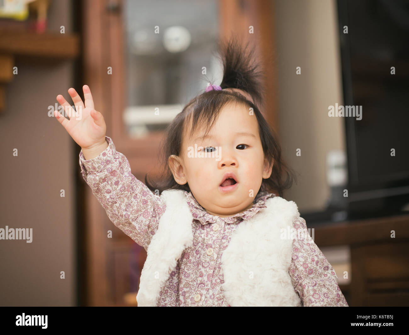 Chinese saying hi hi-res stock photography and images - Alamy