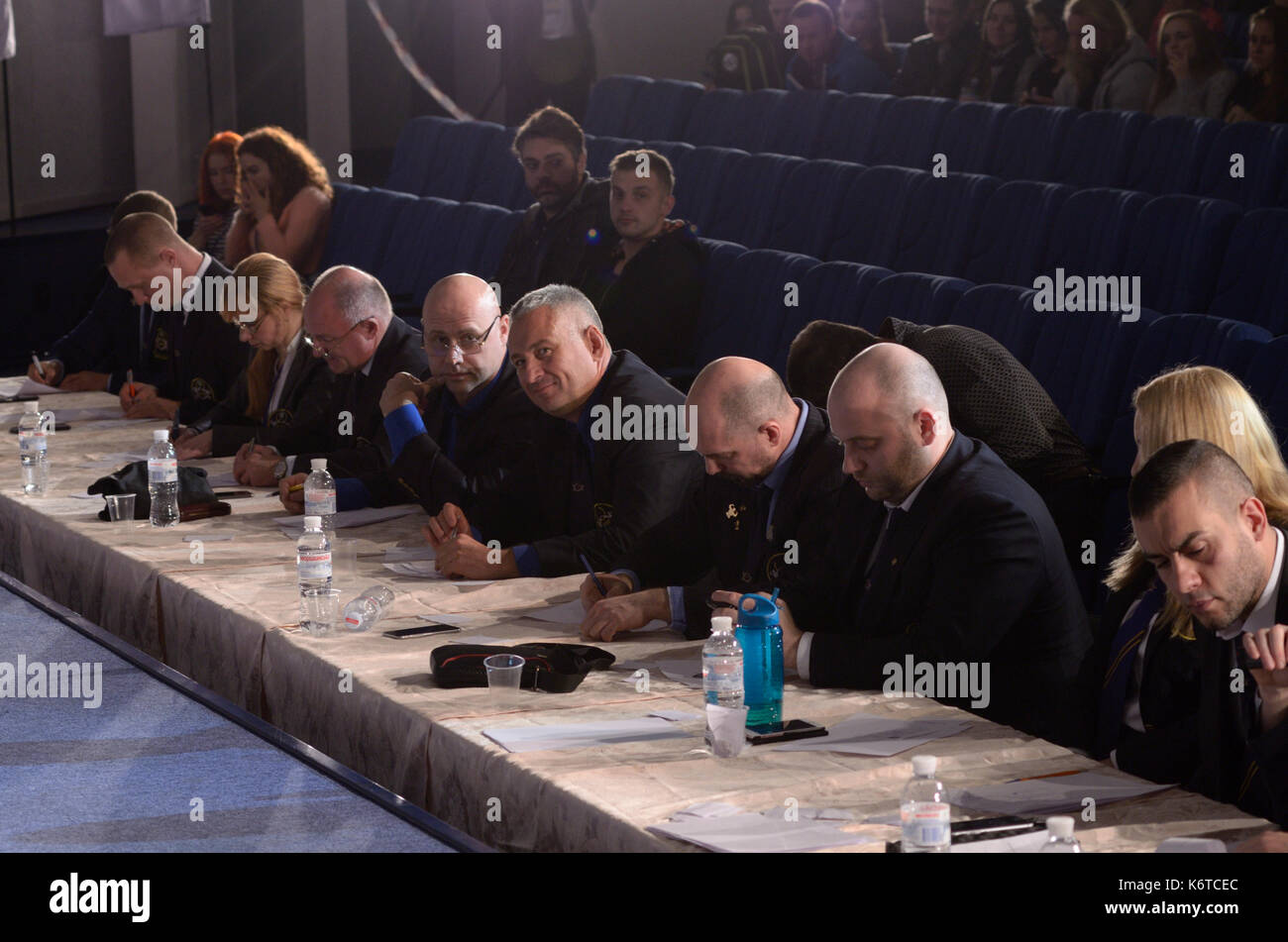 bodybuilding judges estimating performance, preparing scorecards ...