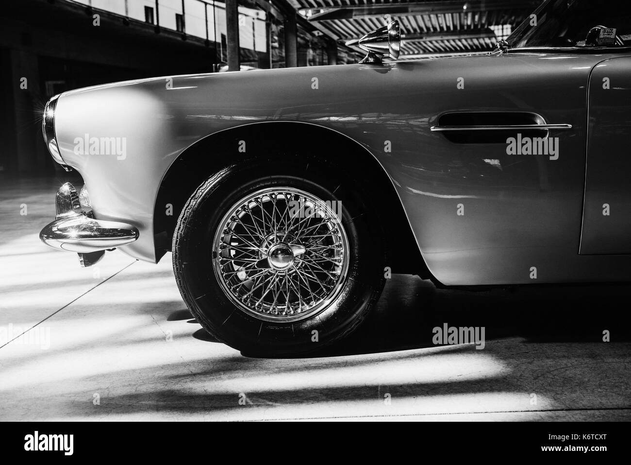 A close up of wheel disk and the side of a vintage automobile Stock ...