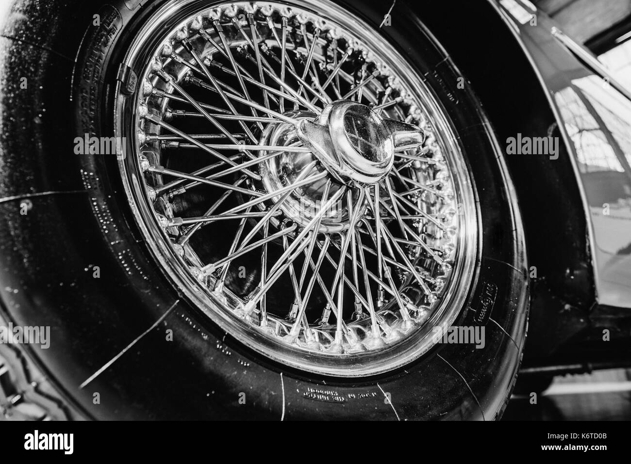 A close up of wheel disk and the side of a vintage automobile Stock ...