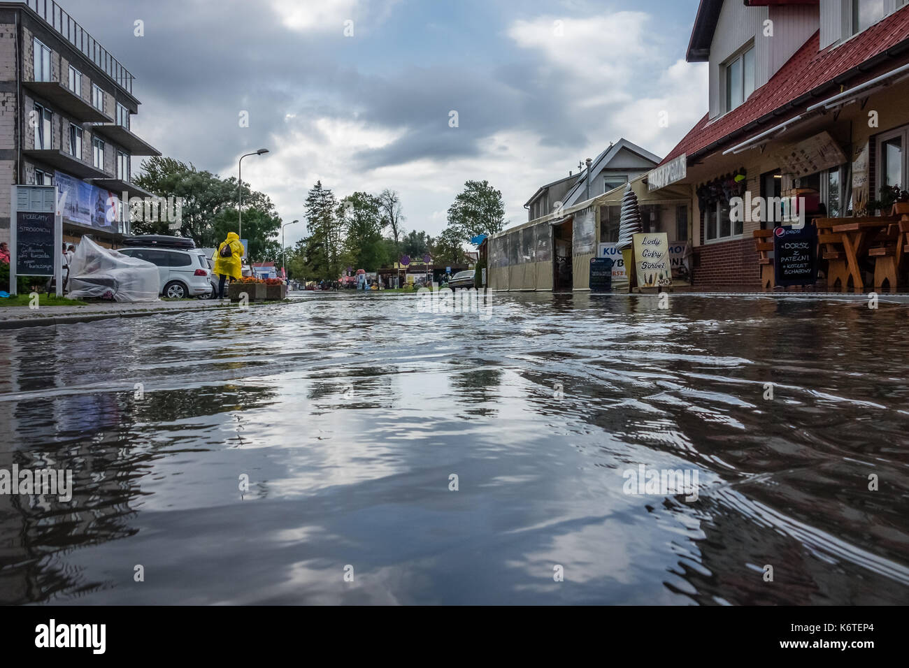 Sarbinowo, Poland - August 2017 : Heavily flooded street after ...