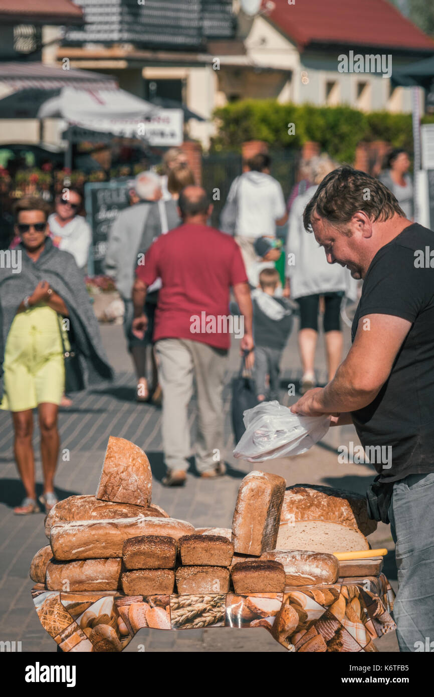 Man selling fresh bread in street hi-res stock photography and images ...