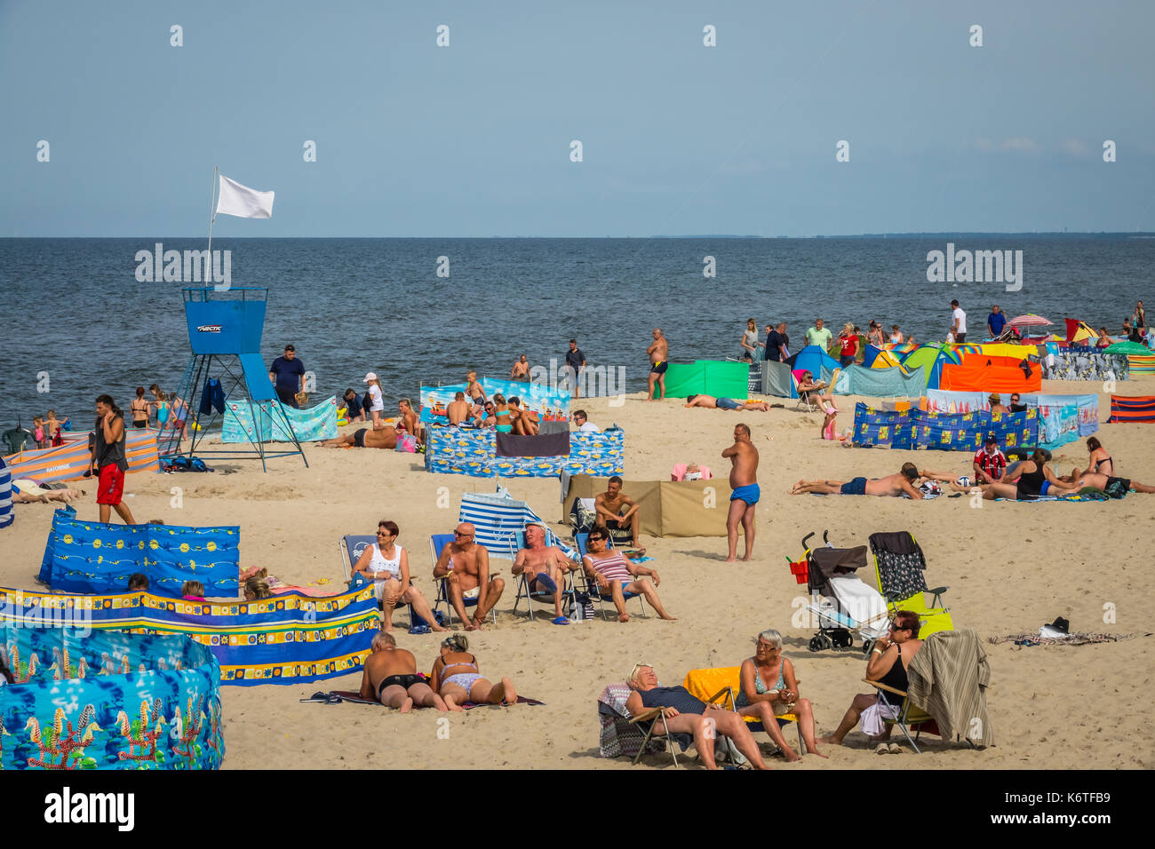 Sarbinowo, Poland - August 2017 : Tourists enjoy the sunny weather and ...